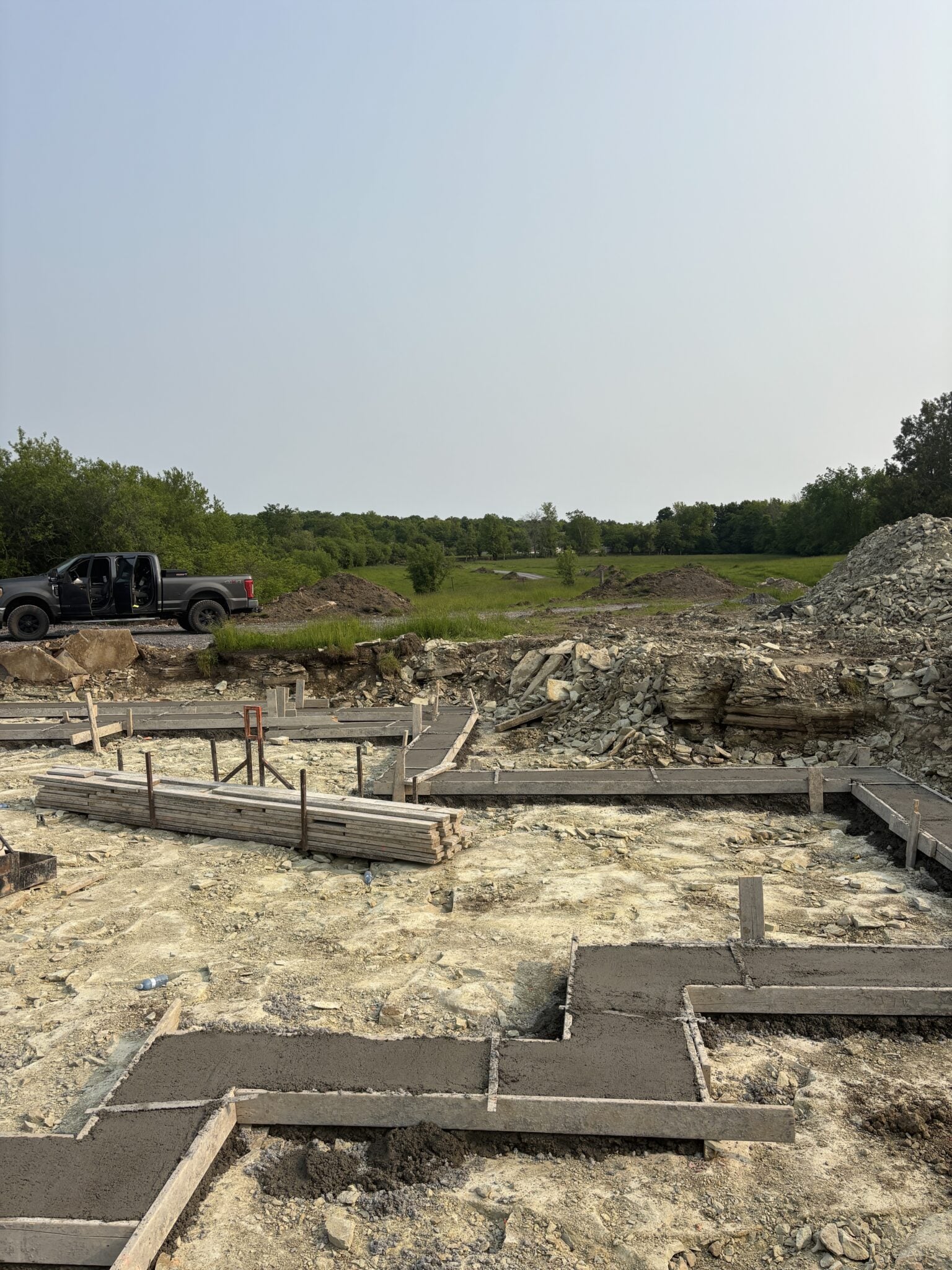 Building Our Home – Step One: Excavation, Slab Prep & Foundation Walls