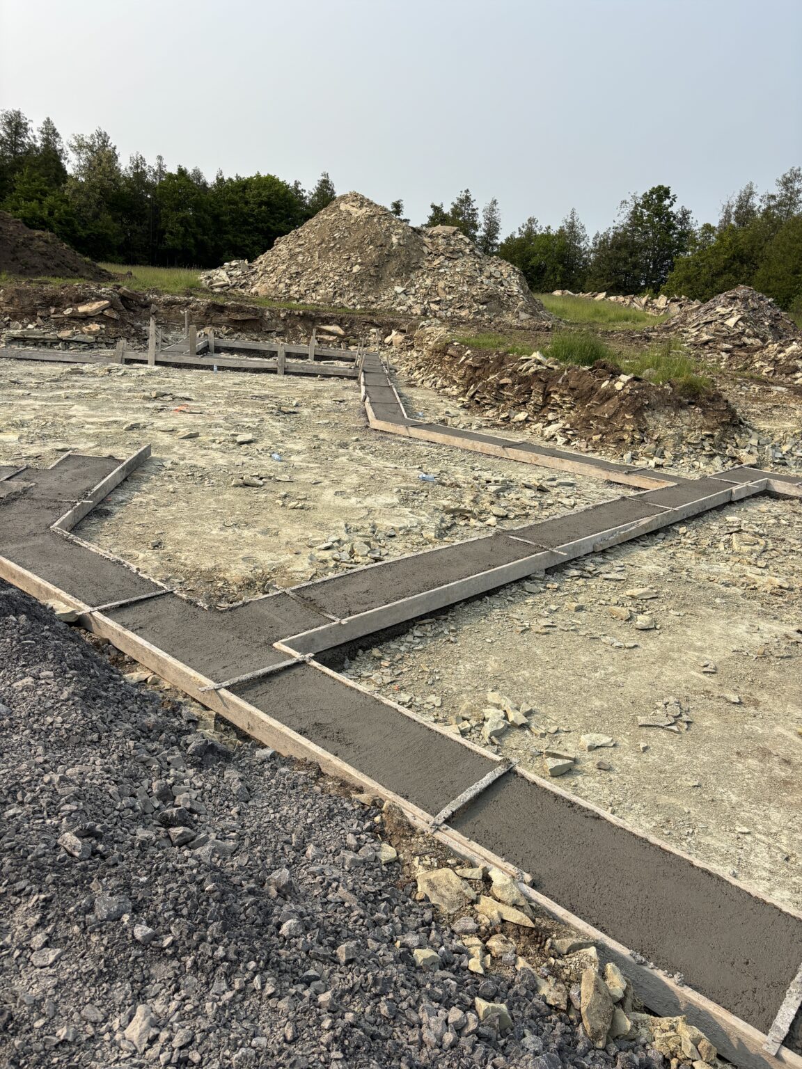 Building Our Home – Step One: Excavation, Slab Prep & Foundation Walls